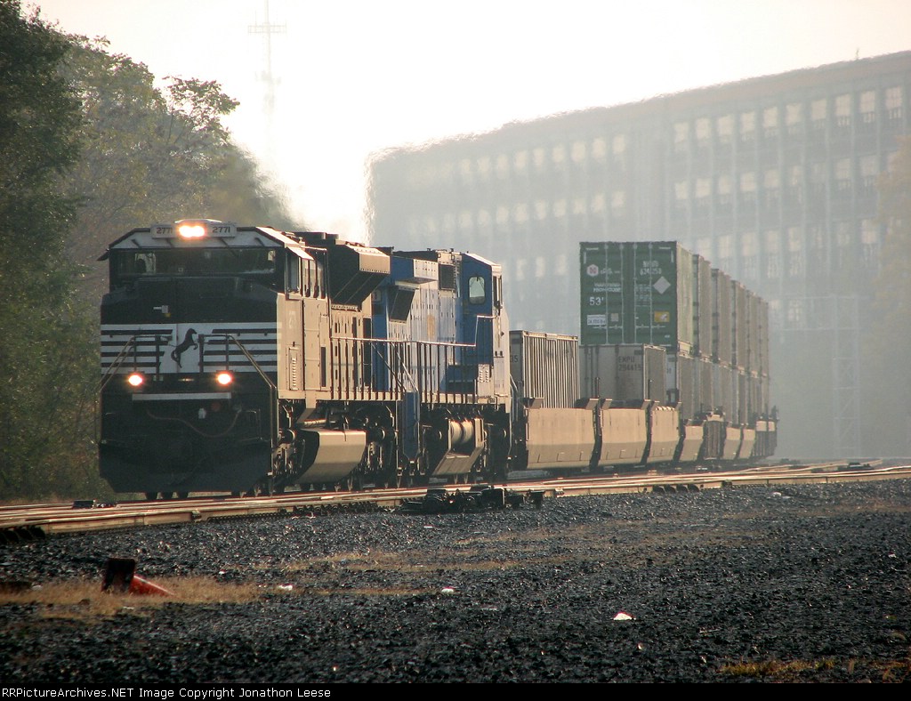 NS 2771 rolls west with 23M's double stacks in tow